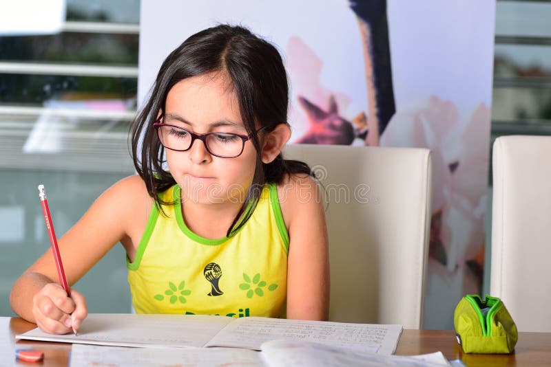 Little Cute Girl Doing Homework Stock Image - Image of shirt, studying ...