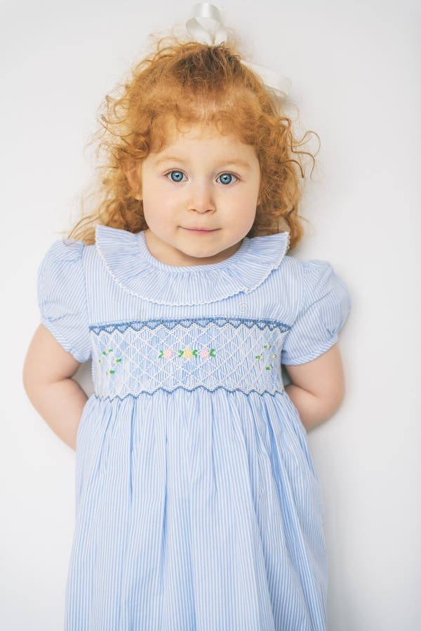Little Cute Girl in a Dress with Redhead. the Child is 2 Years Old ... Little Cute Girl in a Dress with Redhead. the Child is 2 Years Old ...