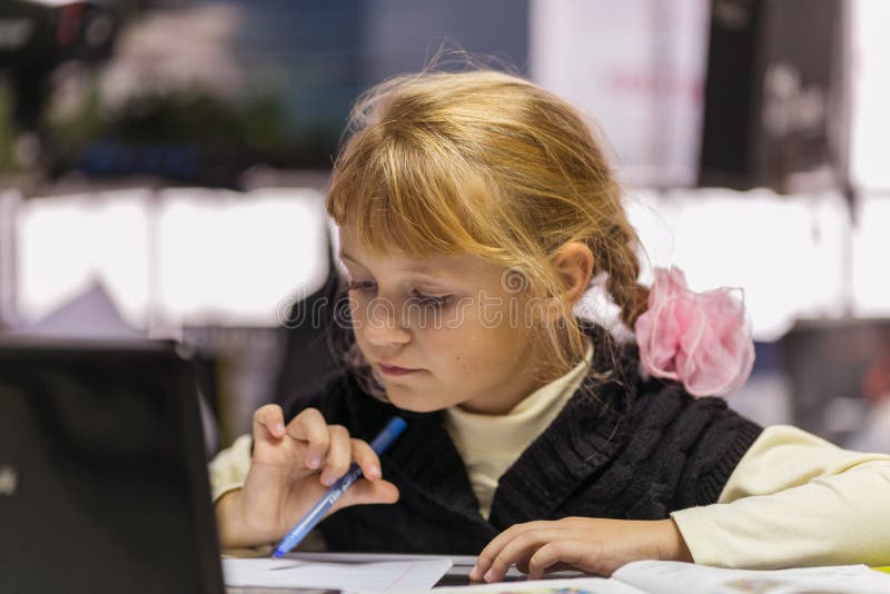 Little cute girl studying stock image. Image of back - 115834231