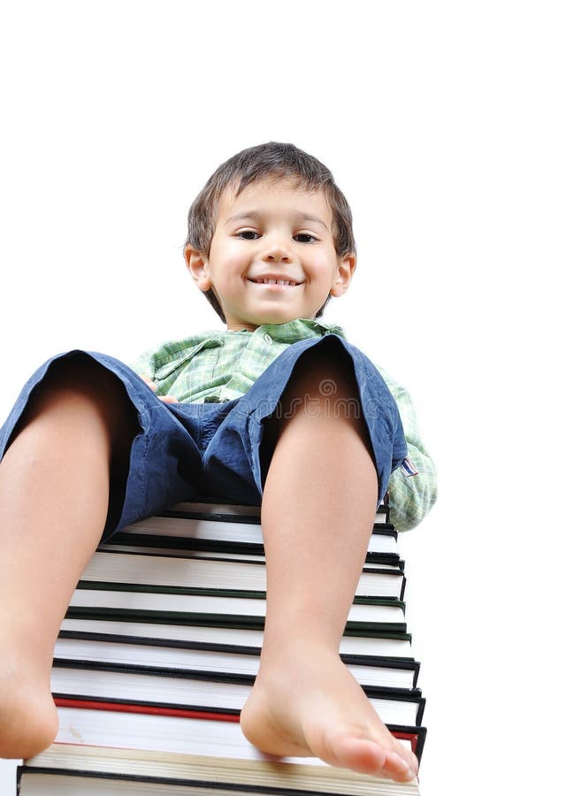A little cute kid on books stock photo. Image of learning - 11253768