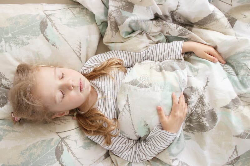 Little Cute Kid Sleeping in the Bed. Concept of Resting Stock Photo ...