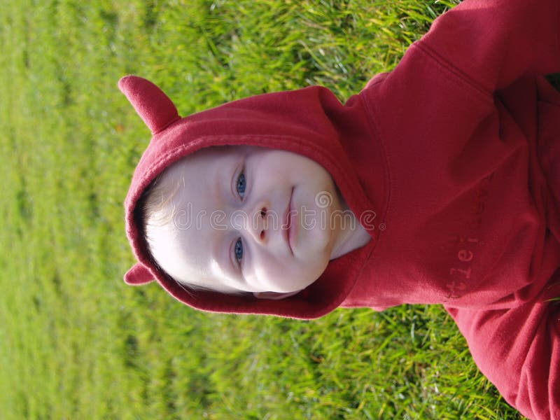 Little Devil stock image. Image of outside, toddler, seated - 2314565
