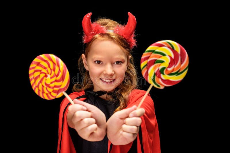 Little Devil with Lollipops Stock Photo - Image of lollipops, costume ...
