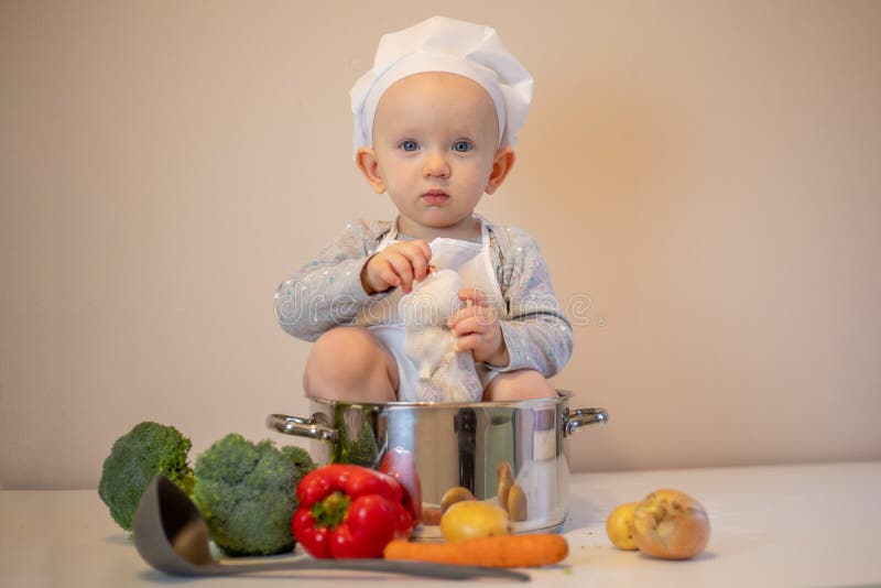 Little Female Chef Preparing Vegetable Soup in Kitchen Stock Image ...