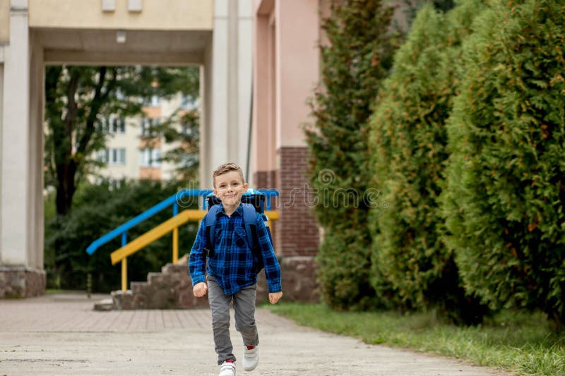 Little First Grader with Backpack Goes Home from School Stock Image ...