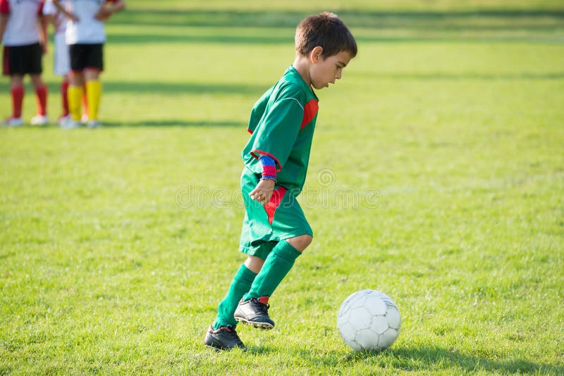 Little football player stock photo. Image of stadion - 33340060
