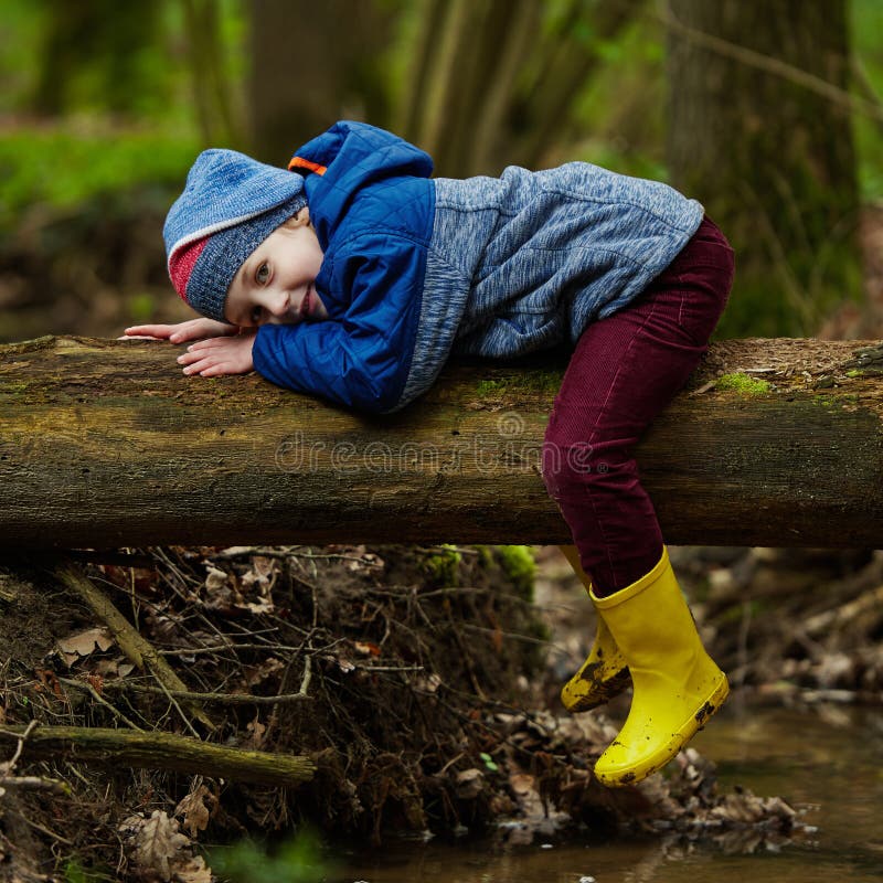 Little Funny Boy on Big Log Stock Image - Image of country, lifestyle ...