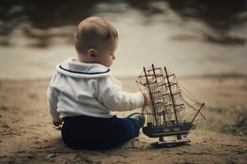 Little funny boy with ship stock image. Image of people - 32826357