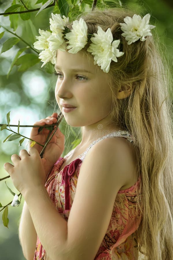 Little girl stock image. Image of childhood, flower, blonde - 25937799
