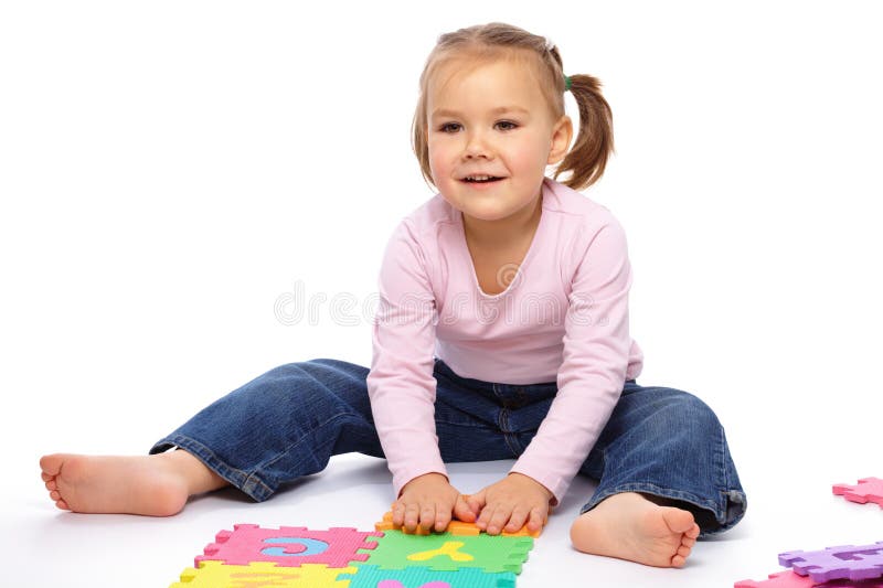Little girl with alphabet stock image. Image of beautiful - 18174087