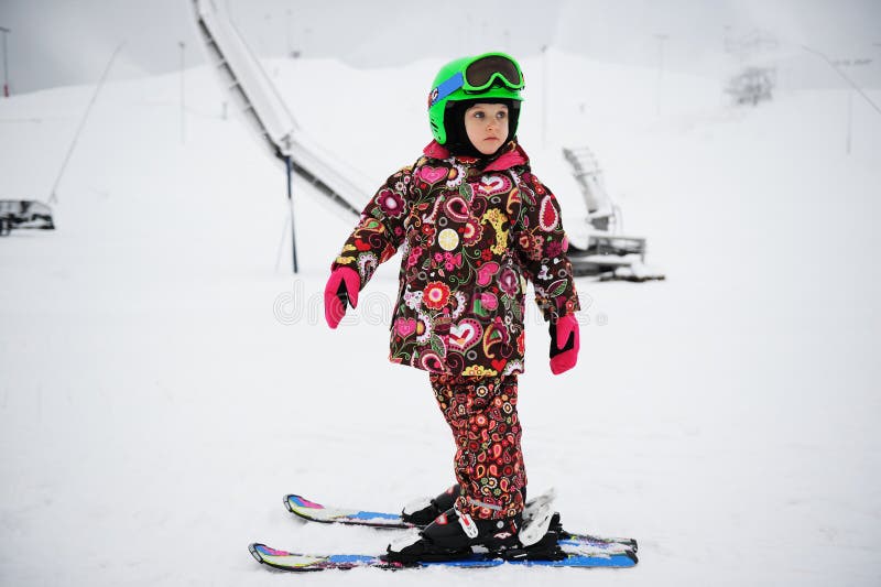 Little girl on Alpine ski stock image. Image of little - 17754913