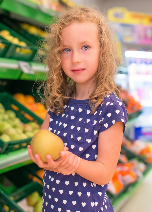 Little girl with apple. stock photo. Image of lifestyle - 46440468