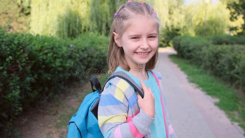 Little Girl Going To School through Park Stock Video - Video of school ...