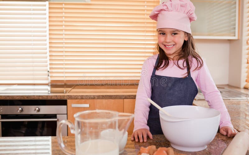 Little girl baking stock image. Image of bake, girls - 22372677