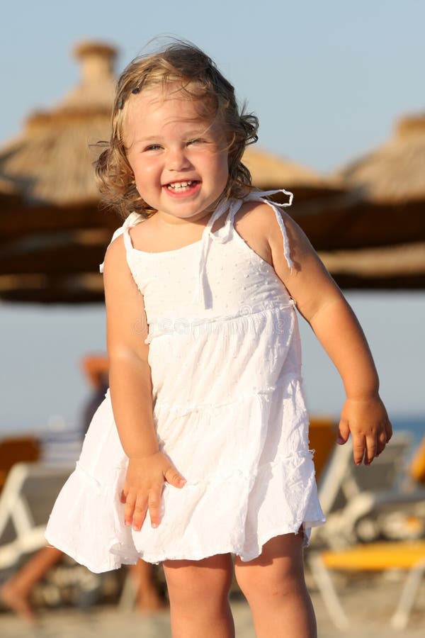 Little girl at beach stock photo. Image of family, azure - 5914082