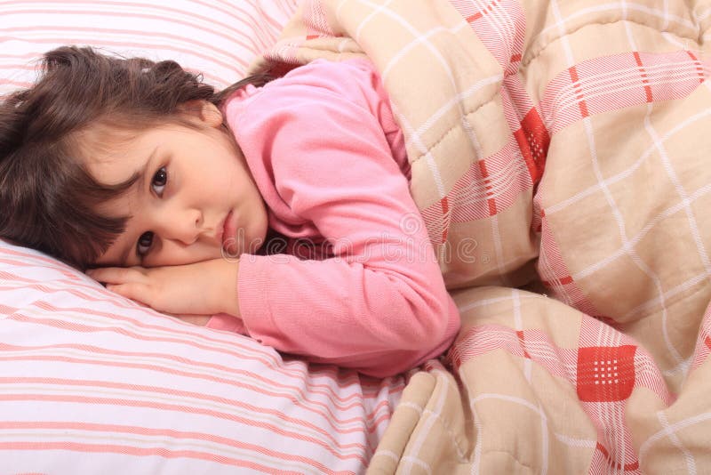 Little girl bedtime stock image. Image of pillow, awake - 21193073