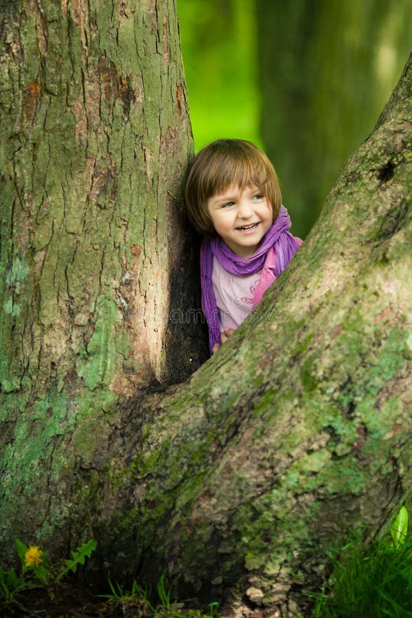 Children Kid Girl Resting Lying on a Tree Branch Stock Image - Image of ...