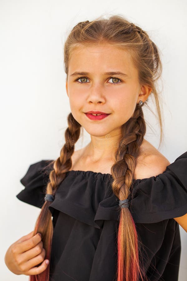 Little Girl in a Black Blouse with Bare Shoulders Stock Photo - Image ...