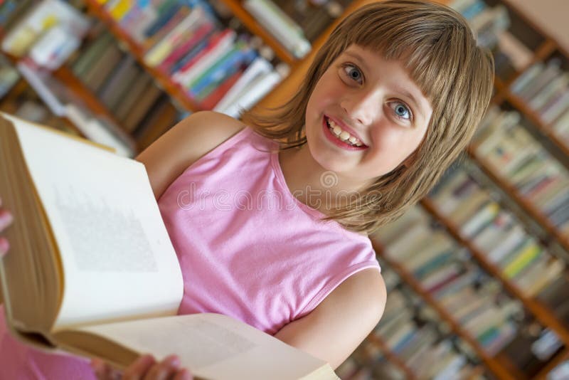 Little girl with book stock image. Image of knowledge - 58489447