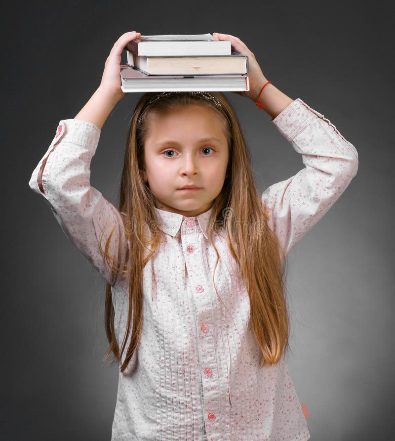 Little girl with books stock image. Image of girl, human - 32263375