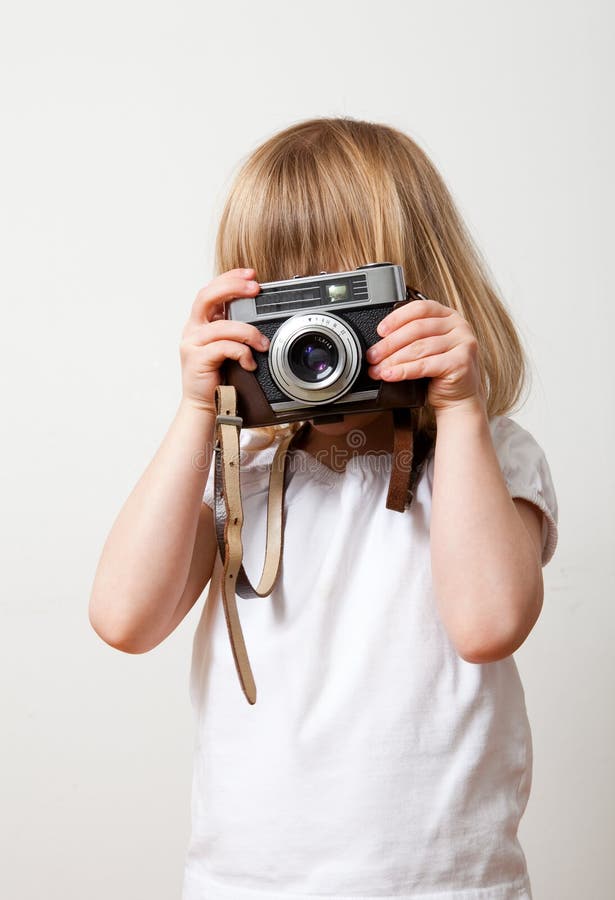Little girl with camera stock image. Image of cute, childhood - 19240029