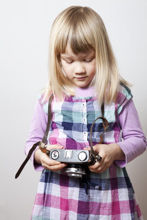 Little girl with camera stock image. Image of human, technology - 23397323
