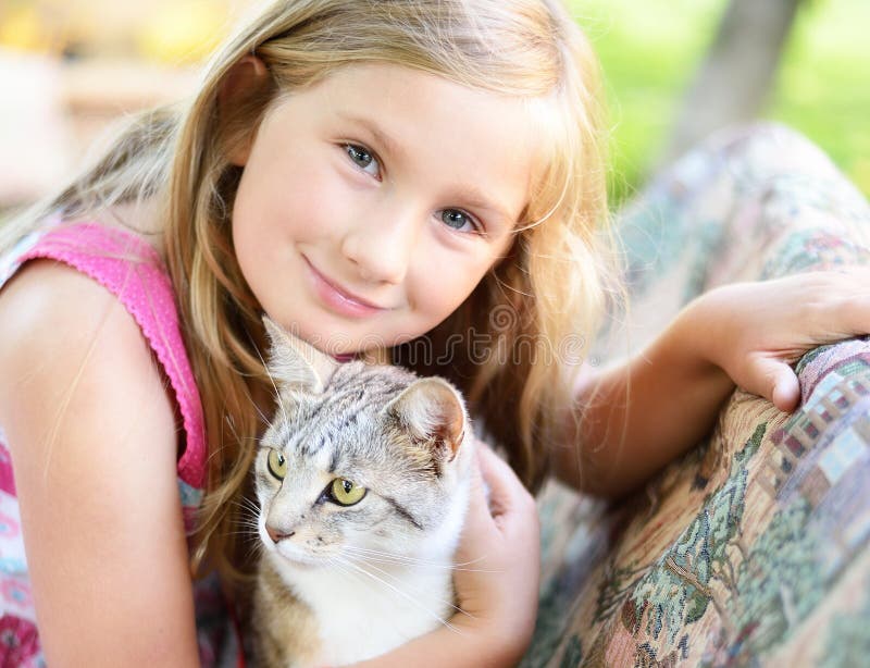 Little girl with cat. stock image. Image of kitten, concept - 49974391