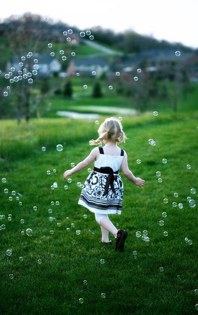 Little Girl Chasing Bubbles Stock Image - Image of happy, bliss: 11785431