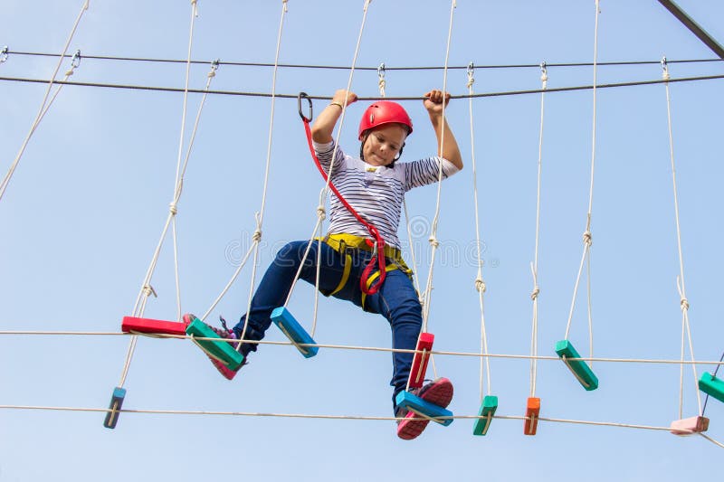 697 Little Girl Climbing Ropes Stock Photos - Free & Royalty-Free Stock ...