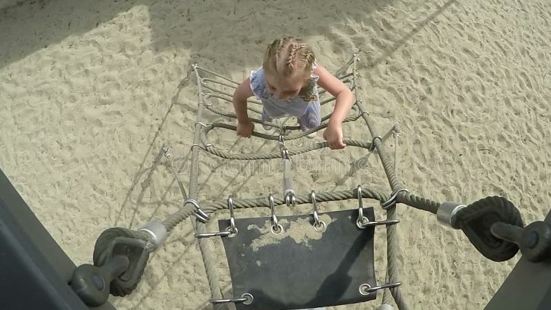 Little Girl Climbs Up the Ladder Stock Footage - Video of rope ...