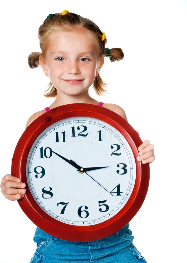 Little girl with clock stock image. Image of education - 20443933