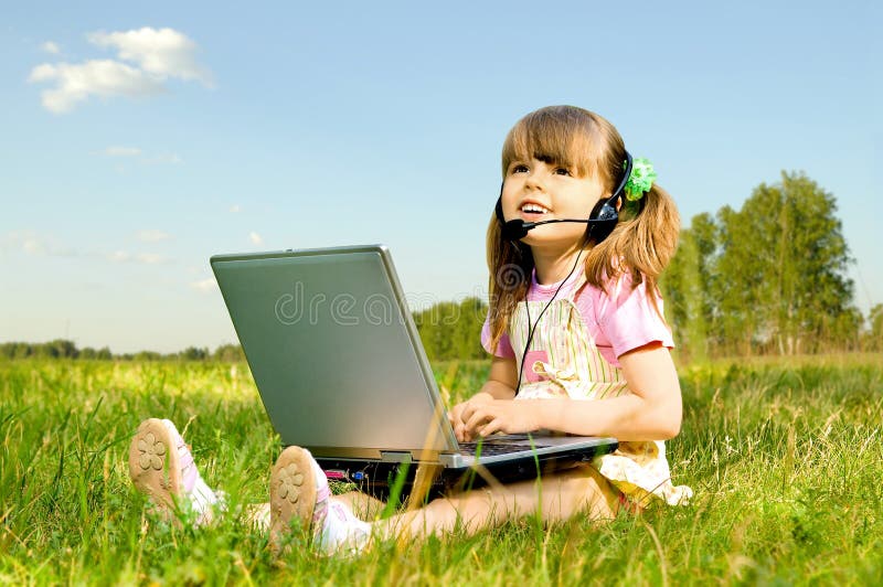 Little girl with computer stock photo. Image of cutie - 18411132