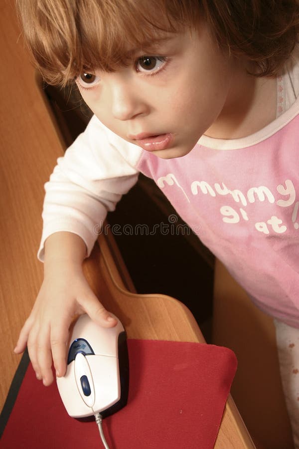 Little girl and computer stock photo. Image of device - 1874552