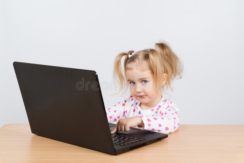 Little Girl at the Computer. Stock Photo - Image of keyboard, laptop ...