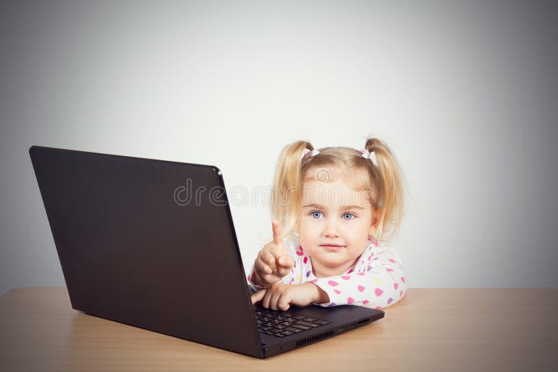 Little Girl at the Computer. Stock Image - Image of learn, people: 72685491