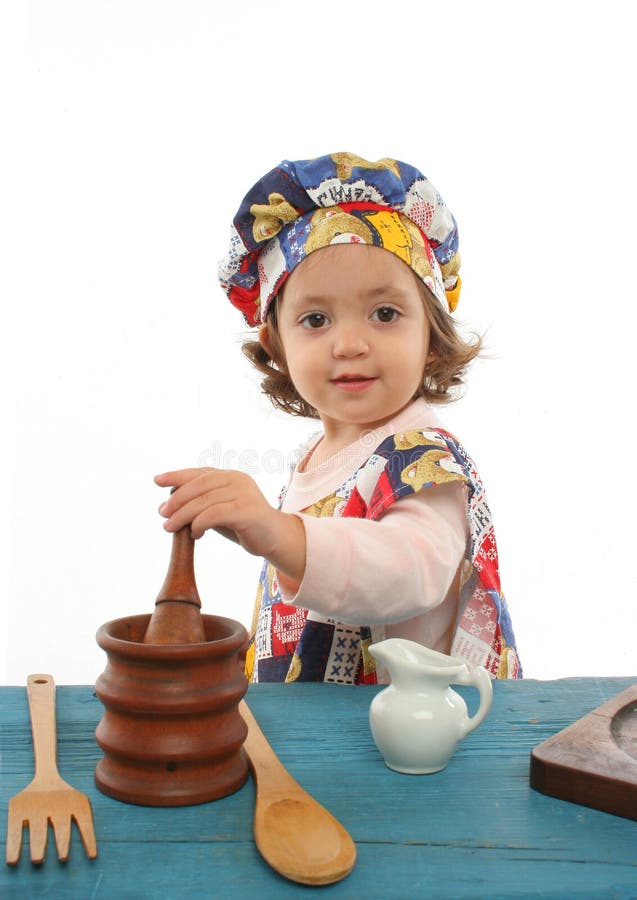 Little Girl Cooking Dressed As a Chef Stock Photo - Image of beautiful ...