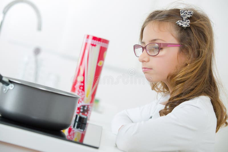 Little girl cooking pasta stock photo. Image of nutrition - 127177790