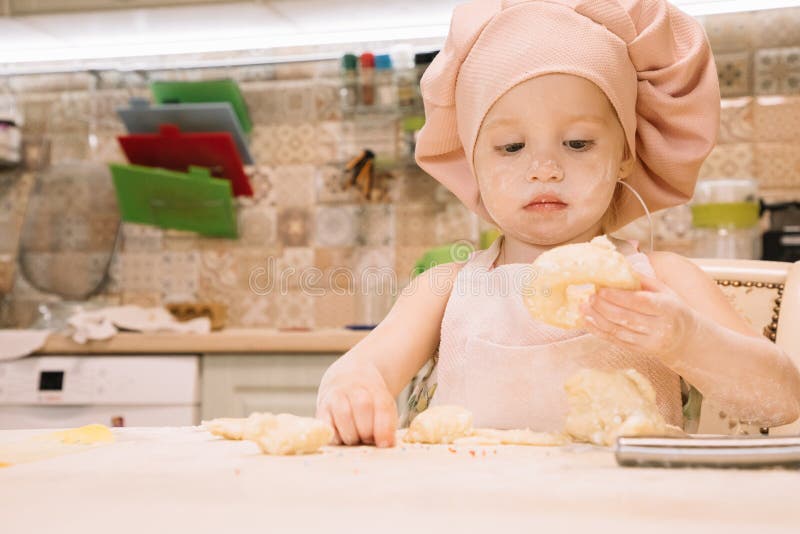 Little Girl Cooks at Home in the Kitchen Stock Photo - Image of kitchen ...