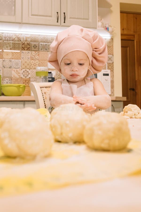 Little Girl Cooks at Home in the Kitchen Stock Photo - Image of ...