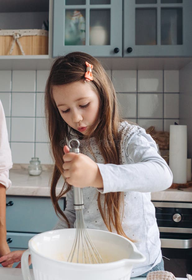 Little Girl Cooks in the Kitchen Stock Photo - Image of cookery, space ...