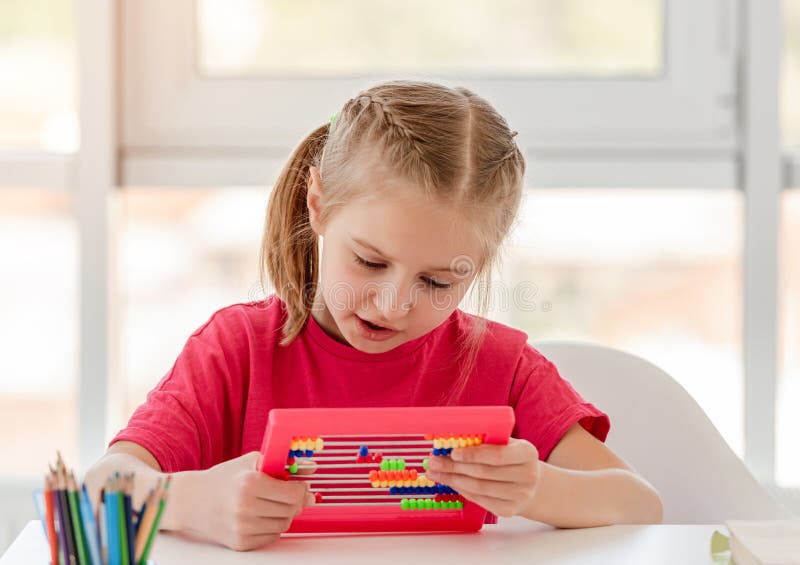 Little Girl Counting on Abacus at School Stock Photo - Image of pupil ...