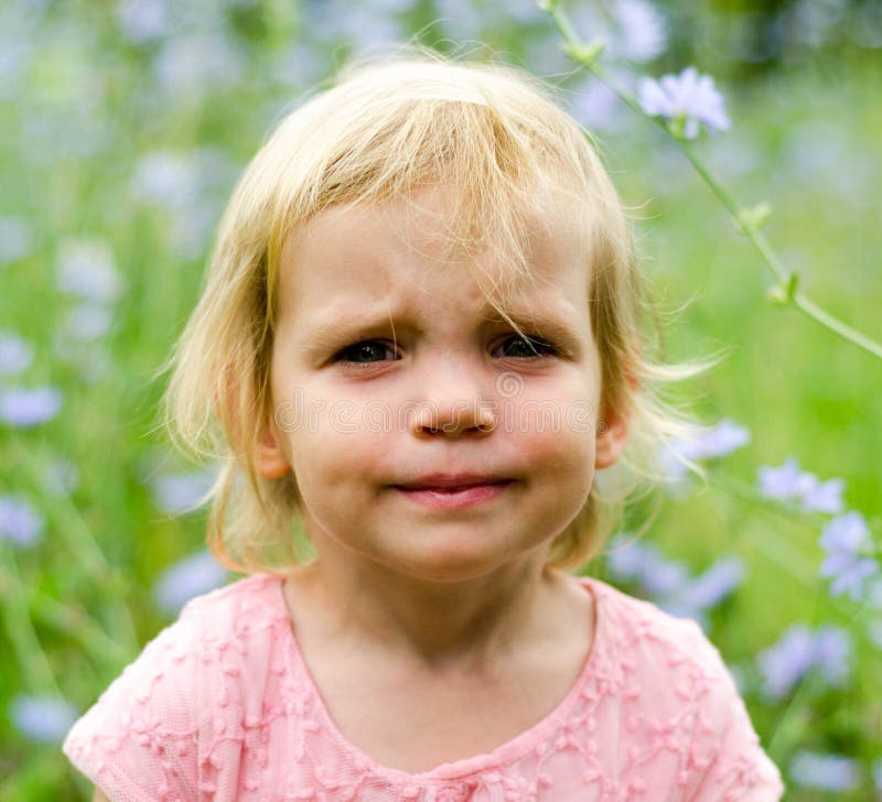 Little Girl with a Cute Grumpy Face Expression Stock Image - Image of ...