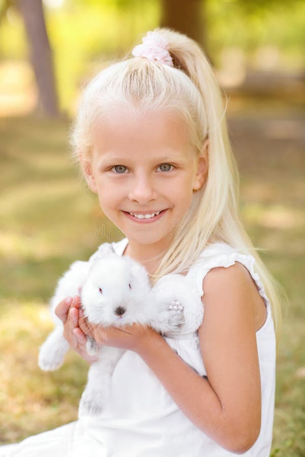 Little Girl with Cute Rabbit Outdoors Stock Photo - Image of rodent ...