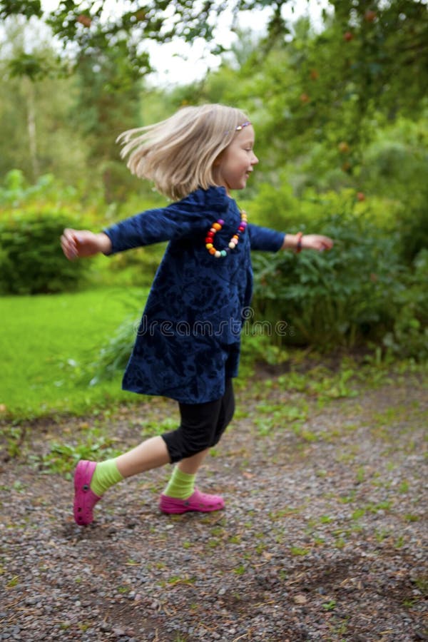 Little girl dancing stock image. Image of happy, childhood - 24007157