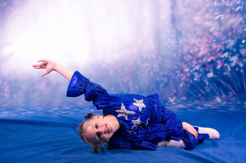 Little Girl Dancing in the Blue Costume Stock Image - Image of ...