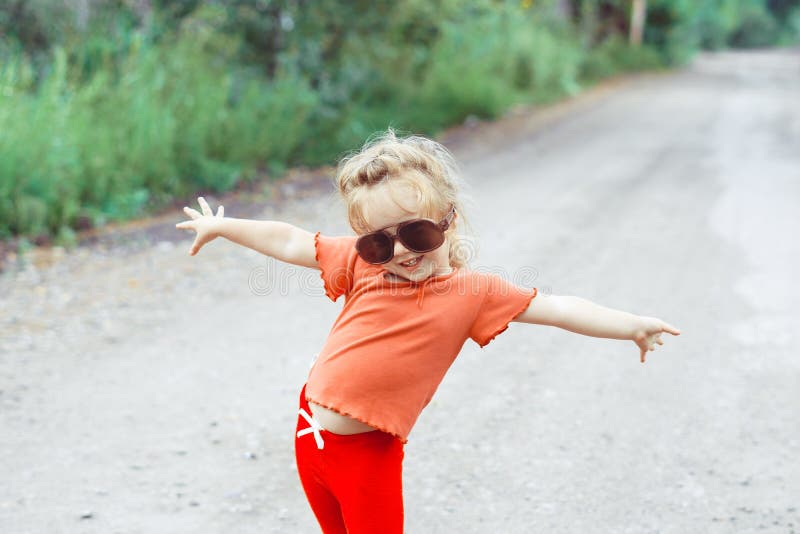 Little Girl Dancing in Glasses Stock Image - Image of holiday, love ...