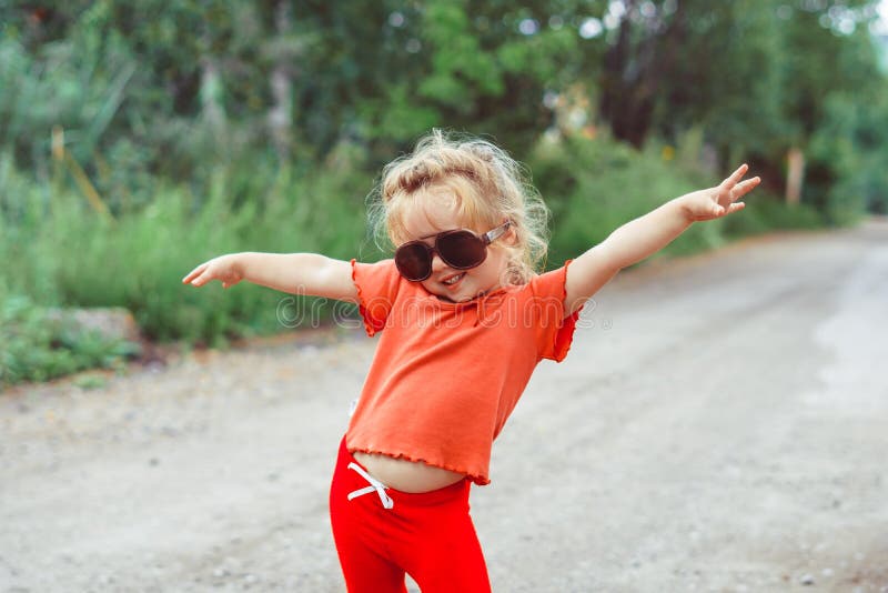 Little Girl Dancing in Glasses Stock Photo - Image of lifestyle ...