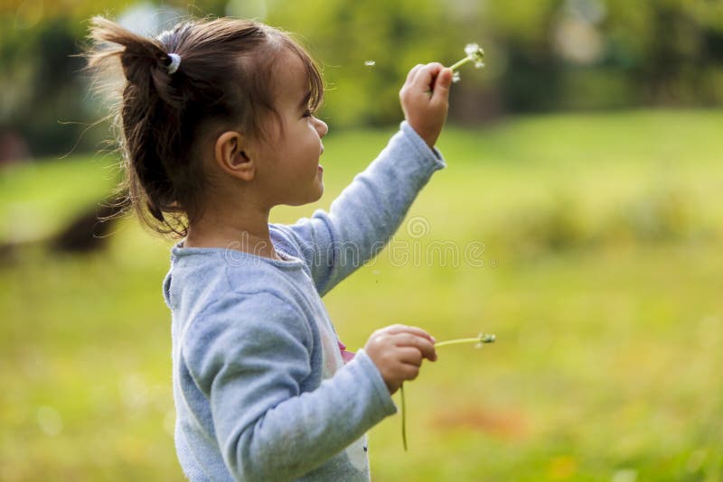 Girl playing the recorder stock image. Image of necklace - 14038035