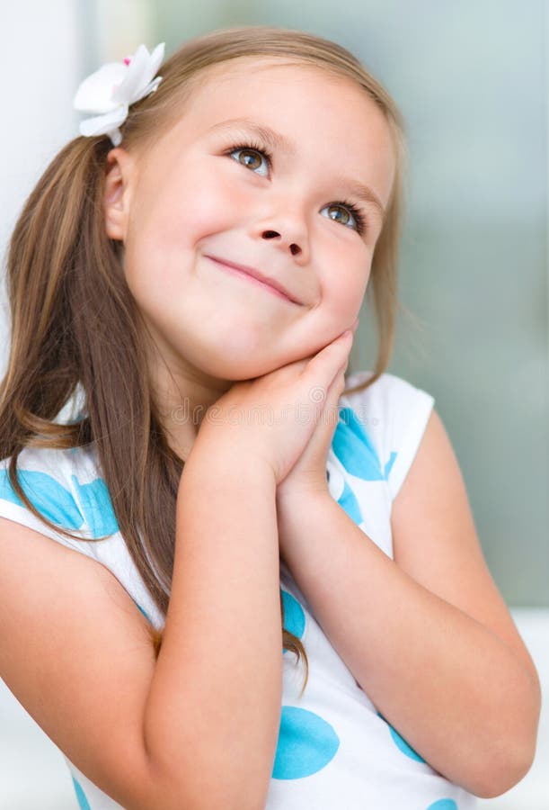 Little girl is daydreaming stock image. Image of smile - 36778873