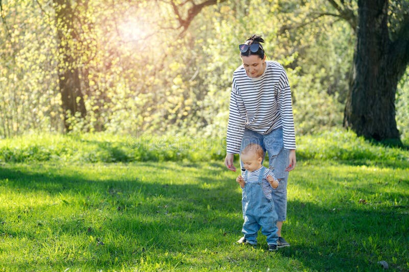 Little Girl Do Her First Steps with Mother S Help Stock Photo - Image ...